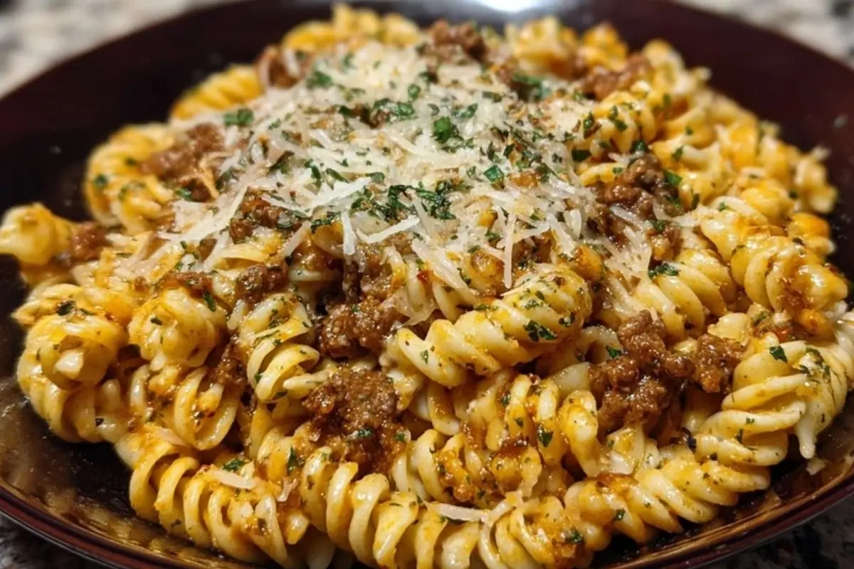Cheesy Garlic Twisted Pasta with Cajun Ground Beef and Alfredo Velveeta